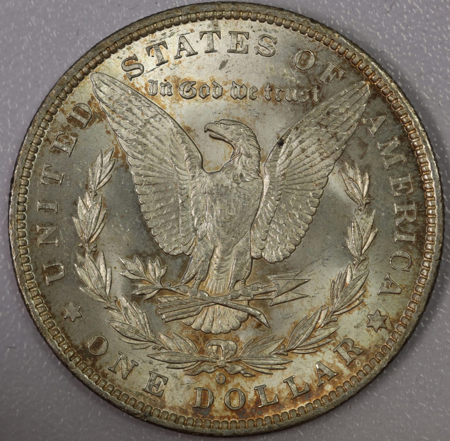 Auction – 1884 O Morgan Dollar UNC Toned – Portsmouth Coin & Currency Co